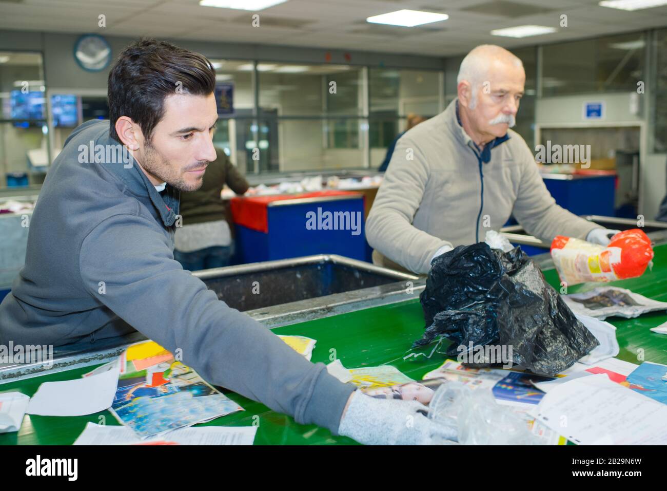 Working in recycling center hi-res stock photography and images - Alamy