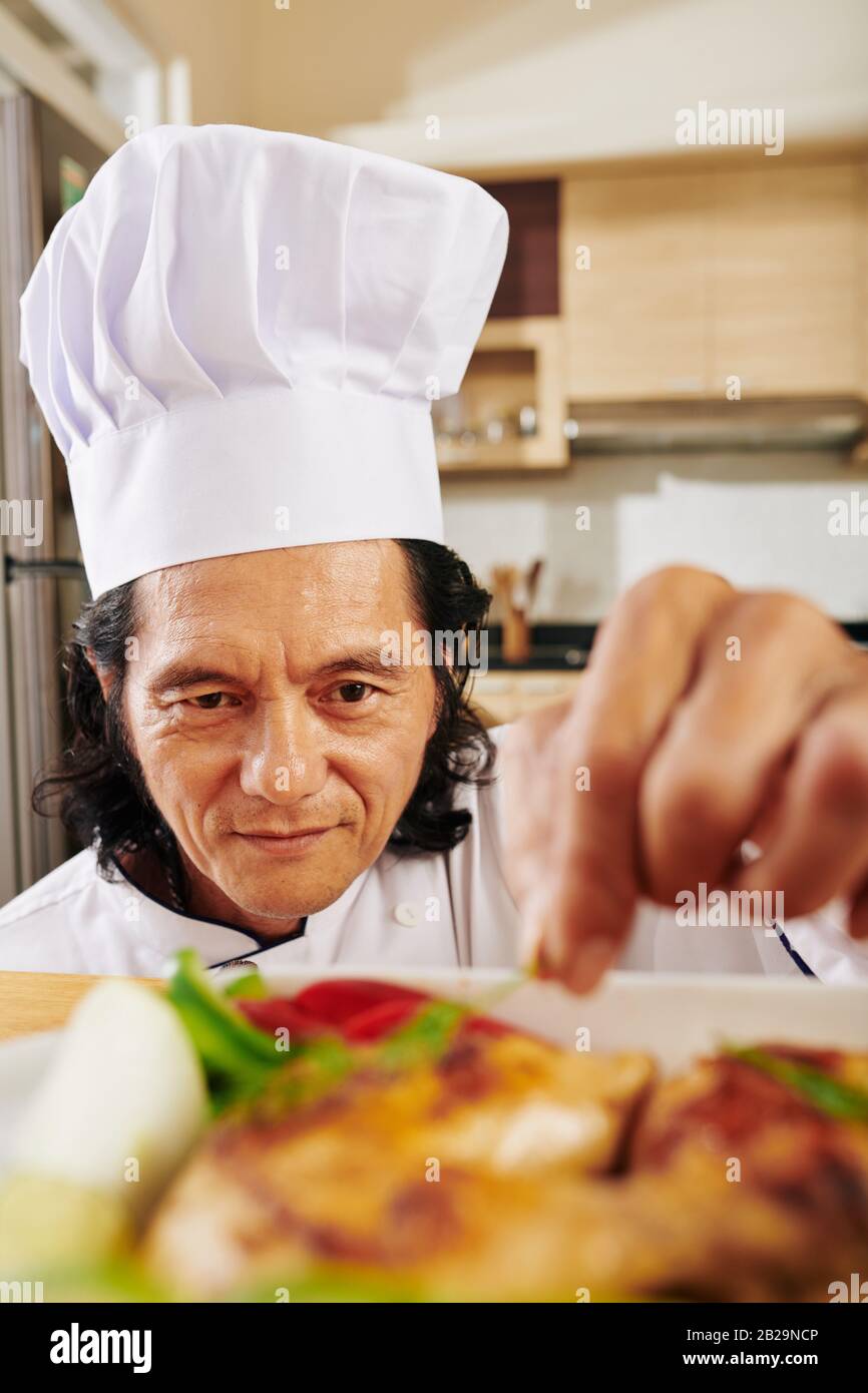Mature men with chefs hat hi-res stock photography and images - Alamy