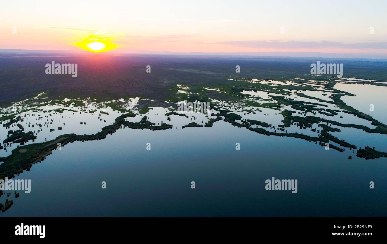 Aerial view of The Ailik Lake during sunset with colorful light. The ...