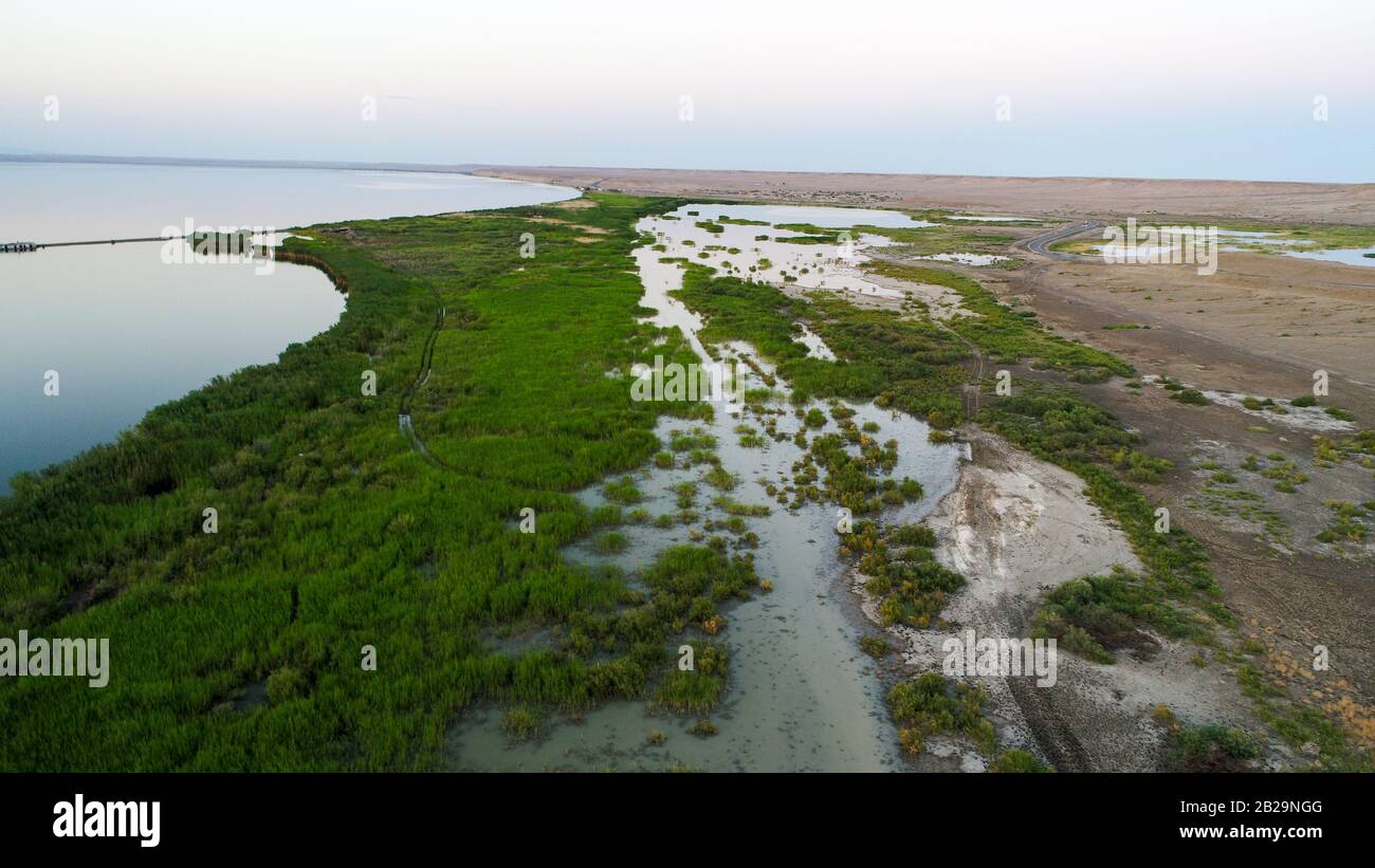 Aerial view of The Ailik Lake during sunset with colorful light. The ...