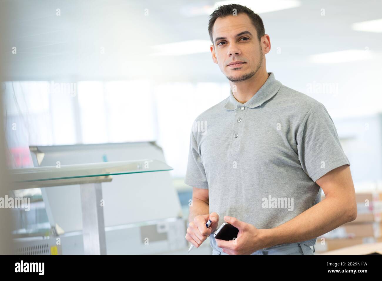 man in storage room Stock Photo - Alamy