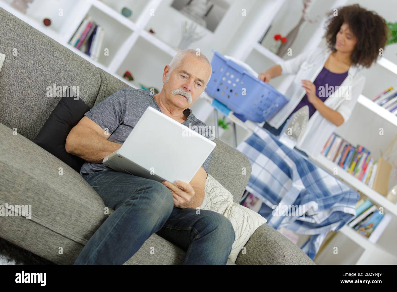 old man using laptop Stock Photo - Alamy