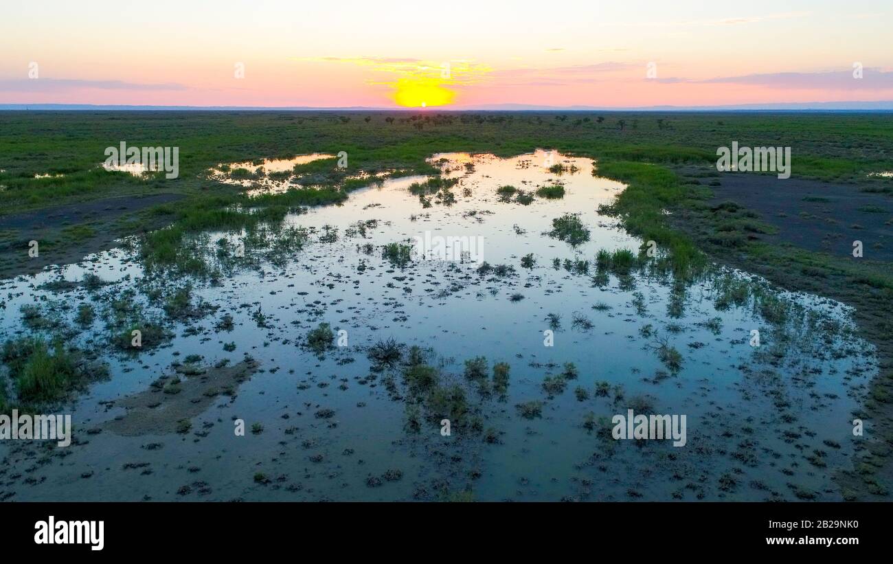 Aerial view of The Ailik Lake during sunset with colorful light. The ...