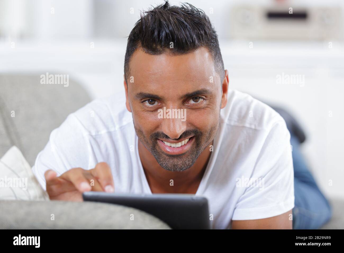 man looking at the computer at home Stock Photo - Alamy