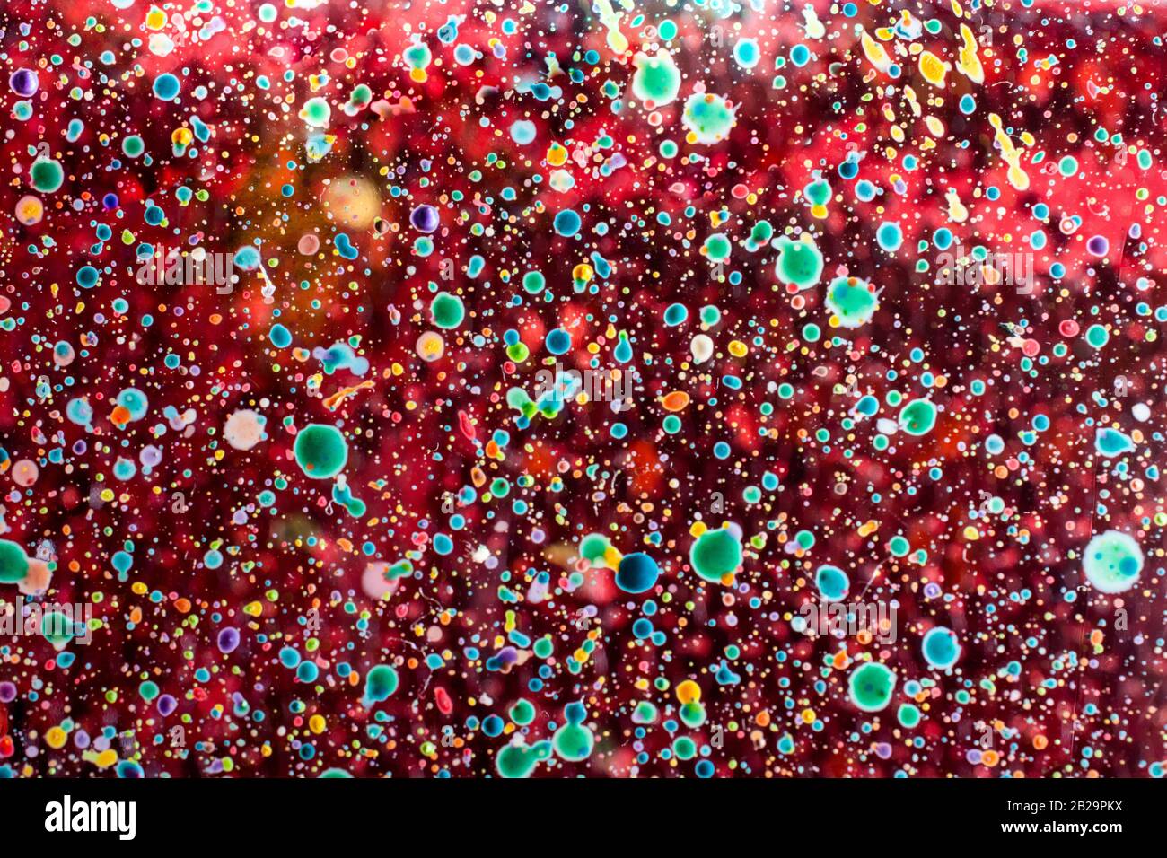 Abstract spots and stains on background formed by splashing watercolor ...