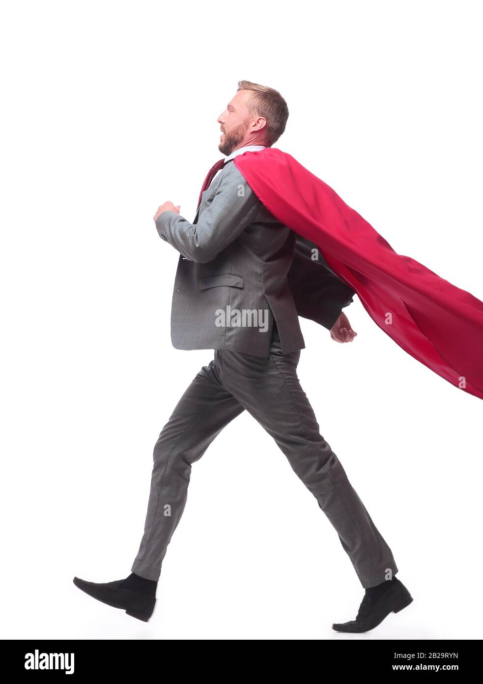 side view. businessman superhero striding towards his goal Stock Photo ...