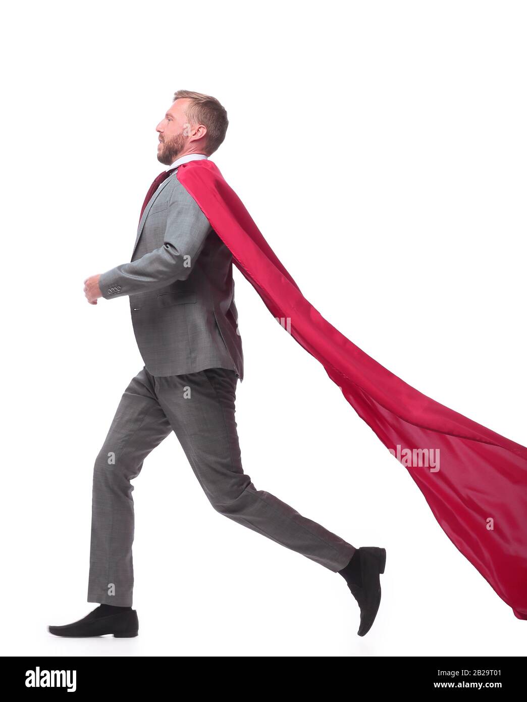 side view. businessman superhero striding towards his goal Stock Photo ...