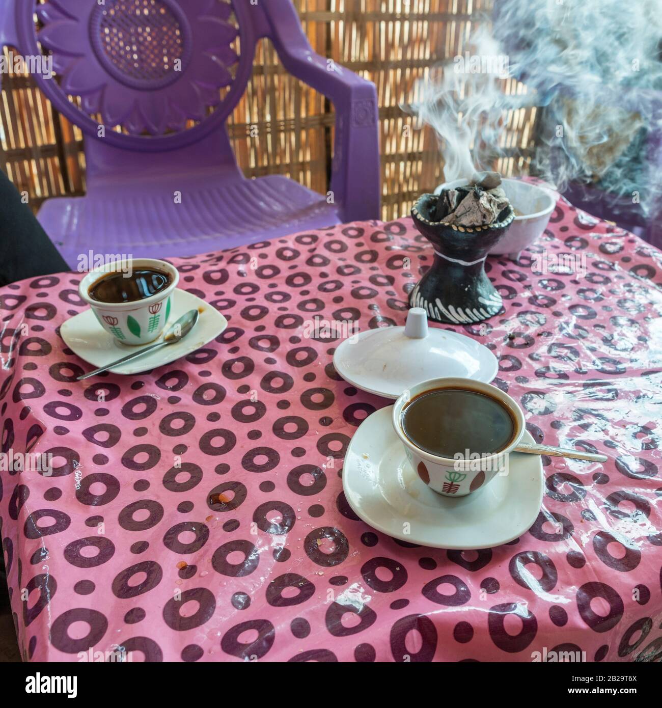 Coffee served in traditional cups, known as finjal, in a buna bets, in ...