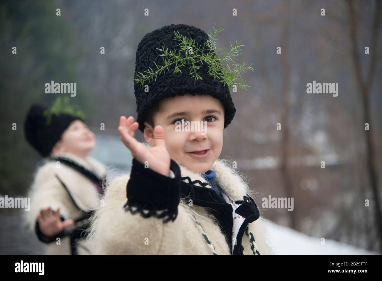 Boys dressed in winter traditional Romanian (Maramuresh region) clothes ...