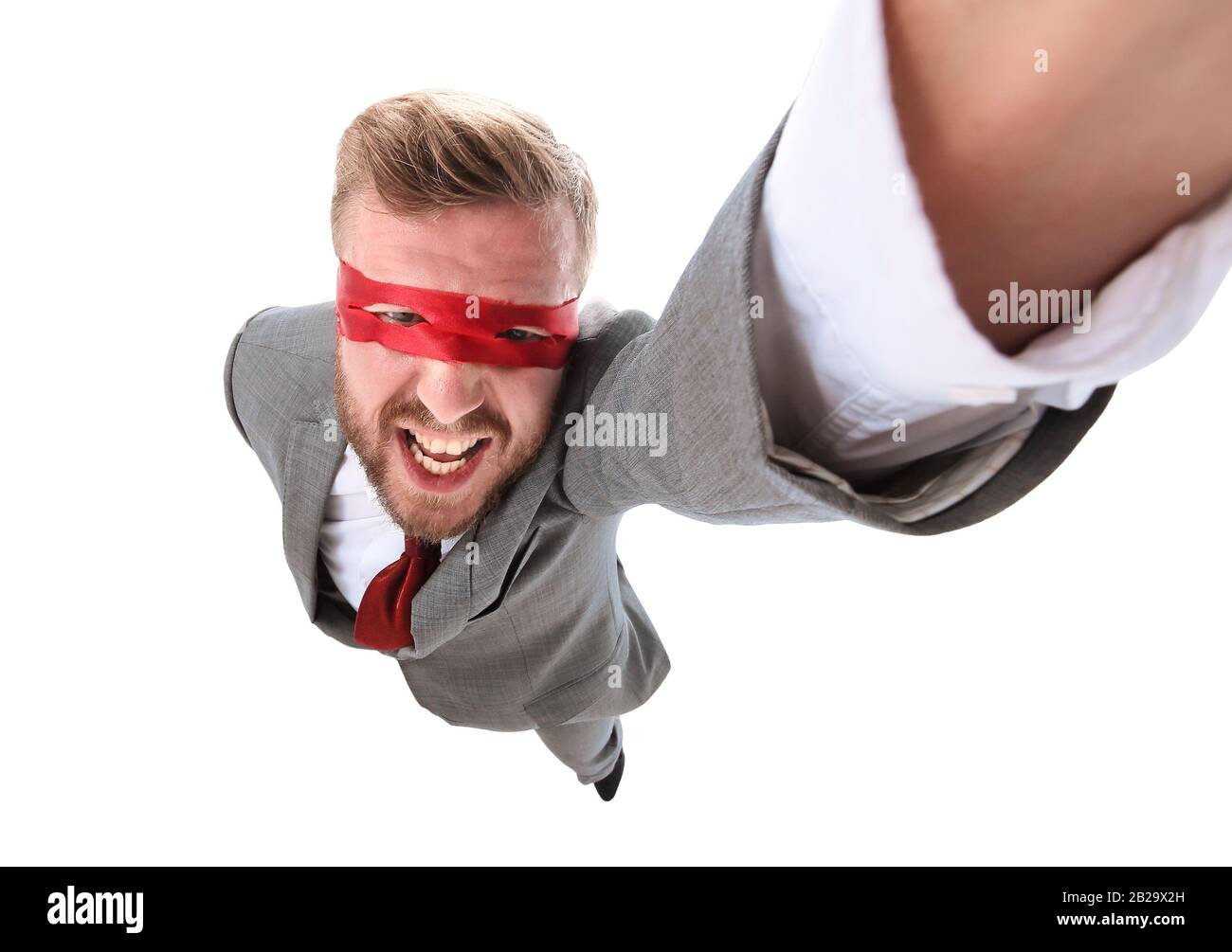 confident superhero businessman flying forward. photo with space for ...