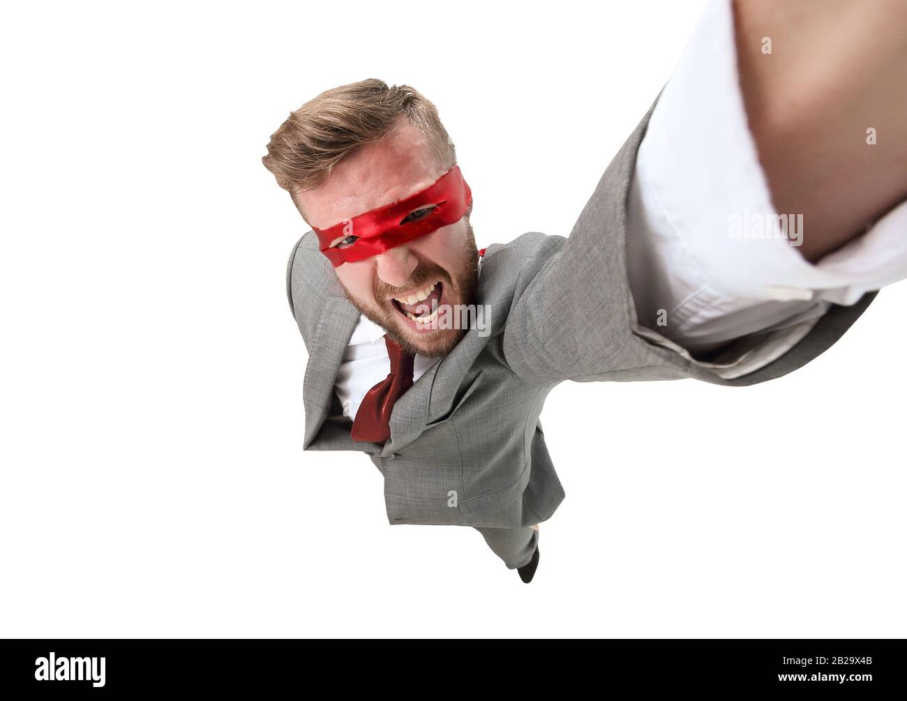 confident superhero businessman flying forward. photo with space for ...