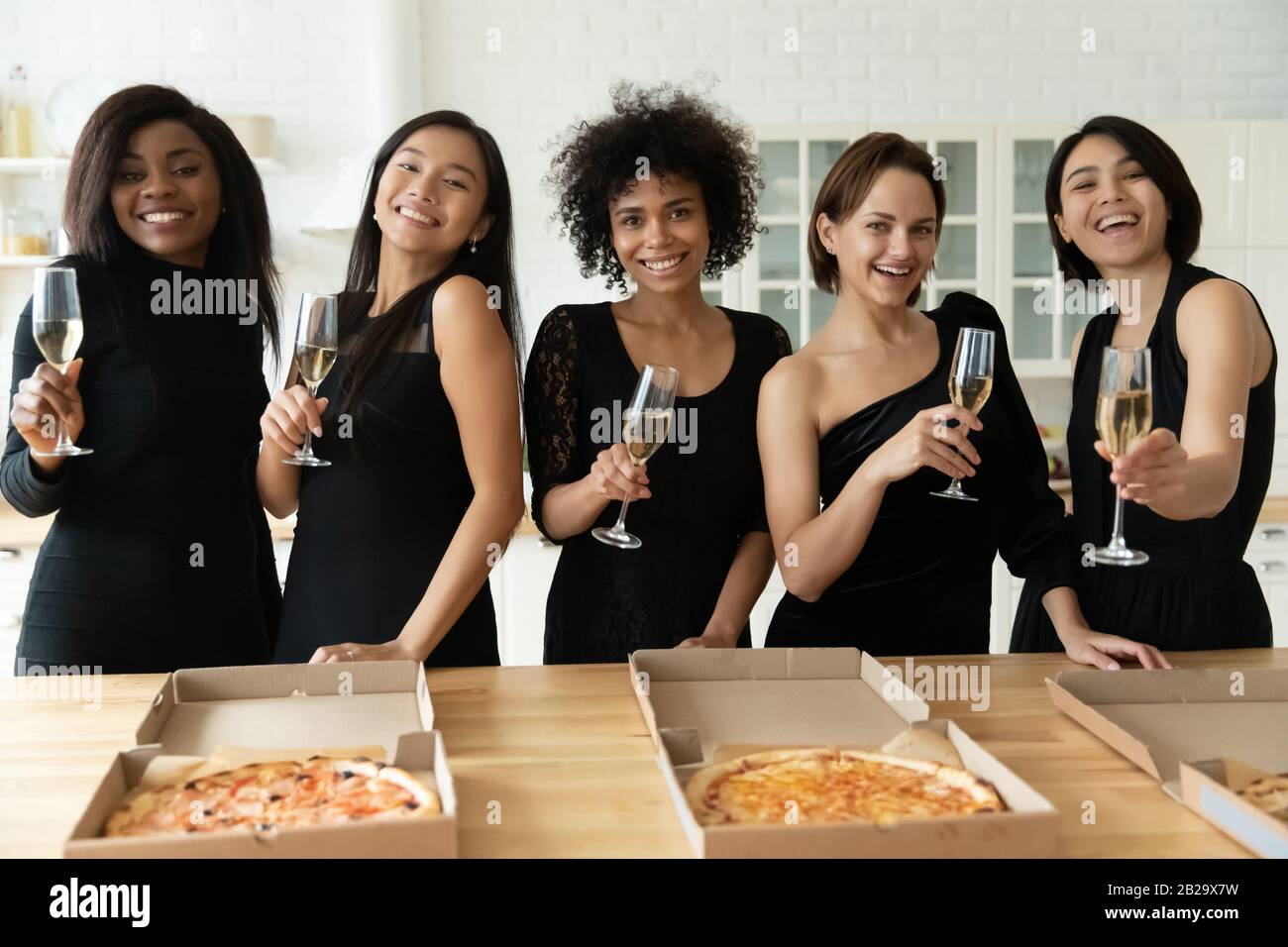 Portrait happy diverse women celebrating at hen party together Stock ...
