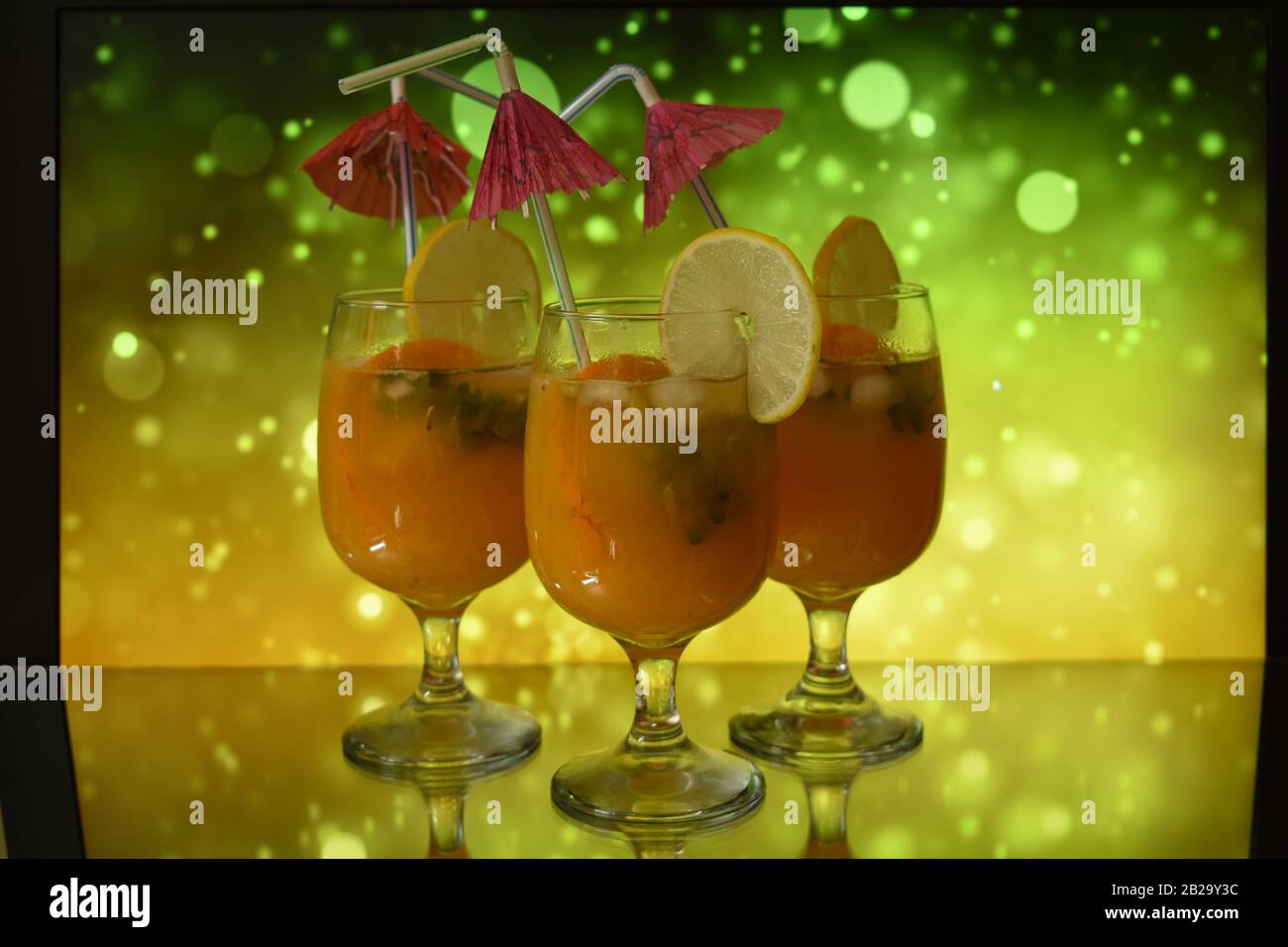 Three orange mocktails Stock Photo - Alamy