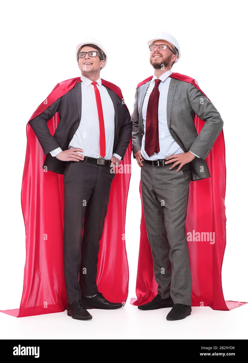 in full growth. two super architect confidently looking forward Stock ...