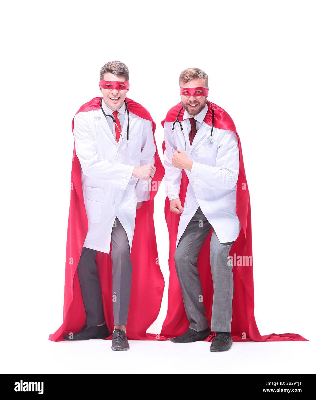 in full growth. two super doctors standing at the start Stock Photo - Alamy