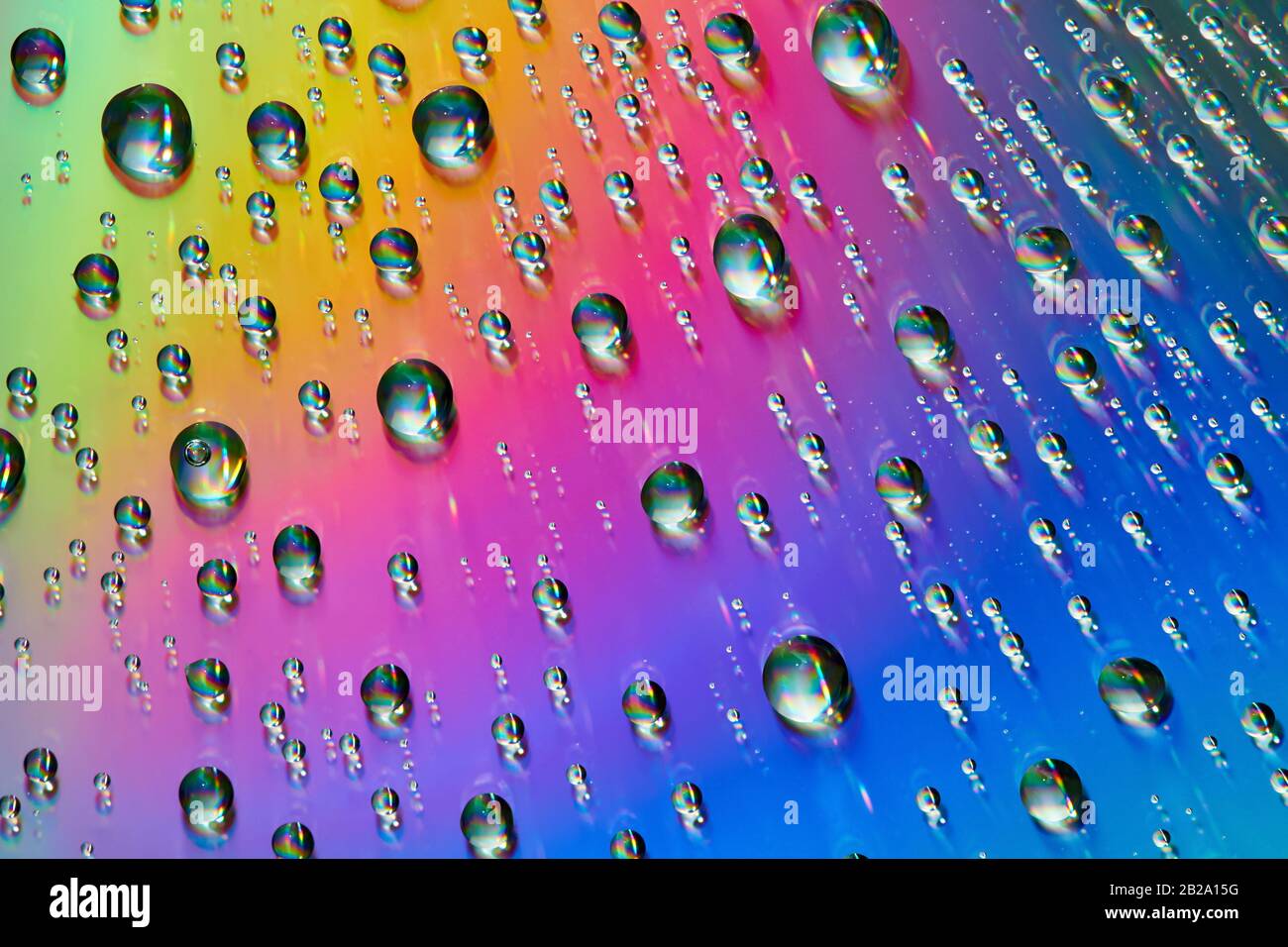 Water drops with reflection of the rainbow. Colorful abstract ...