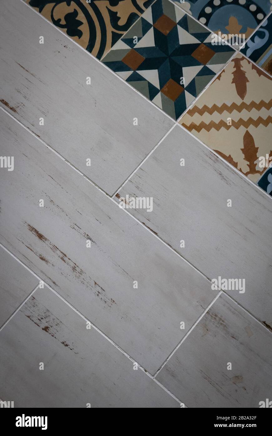 Vintage ceramic tiles mosaic on the wall Stock Photo - Alamy