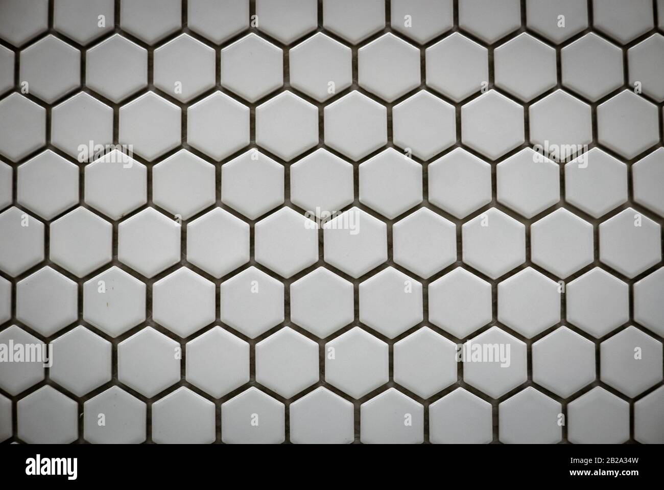White ceramic cells on the wall as background Stock Photo - Alamy