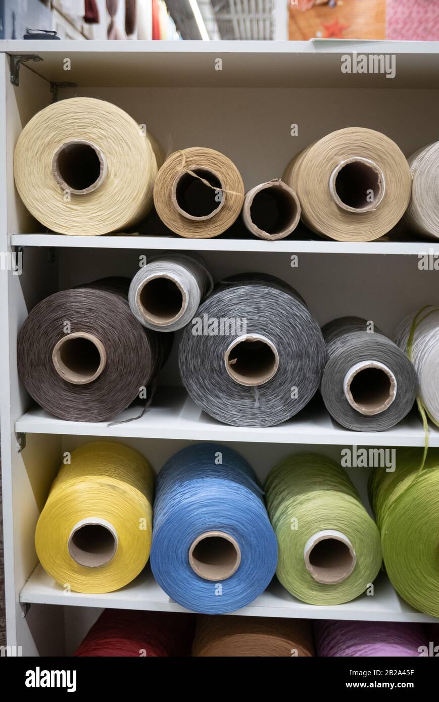 Stack of cotton reels hi-res stock photography and images - Alamy