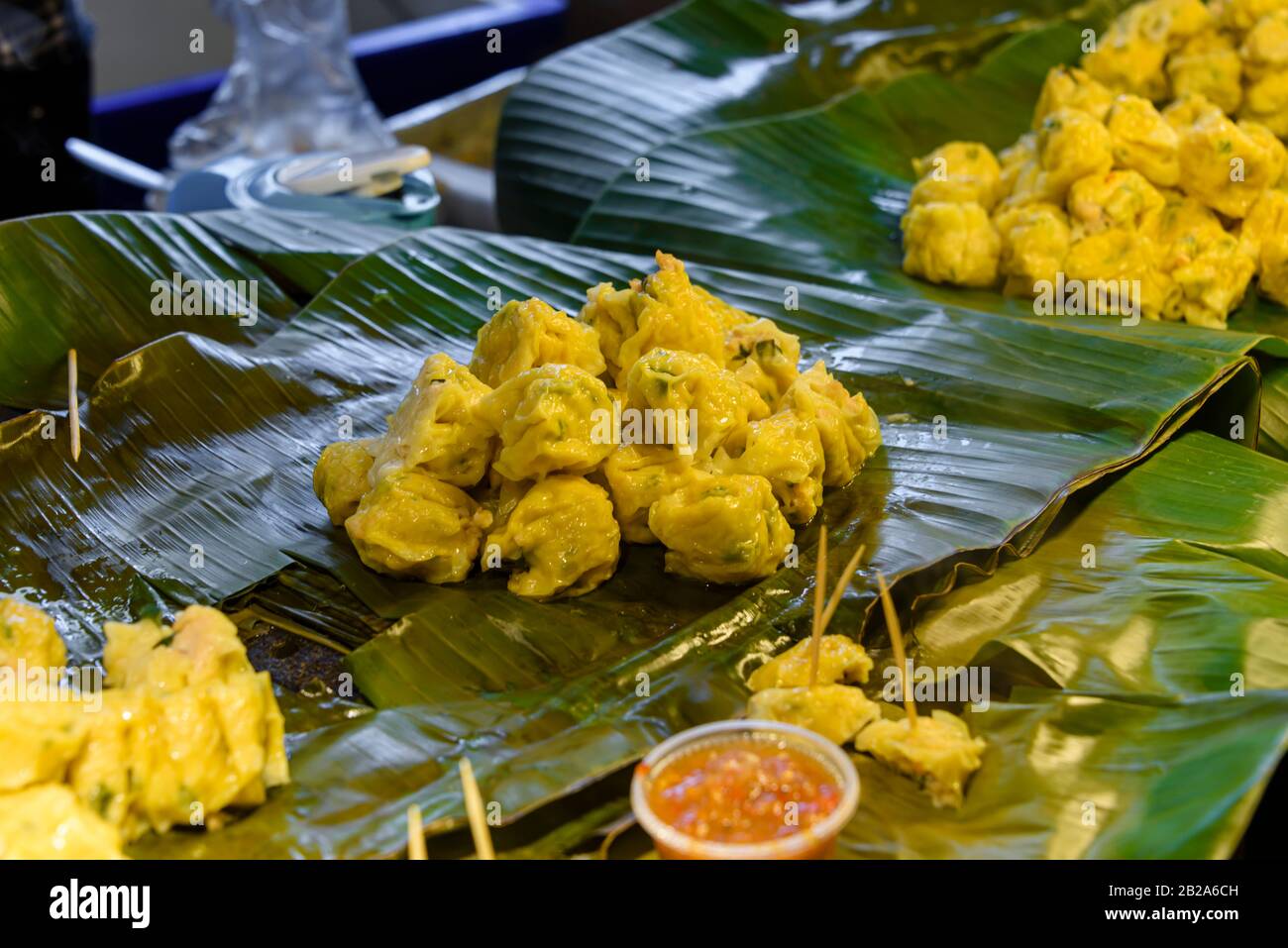 Small cooked dumplings at a street food stall, Bangkok, Thailand Stock ...