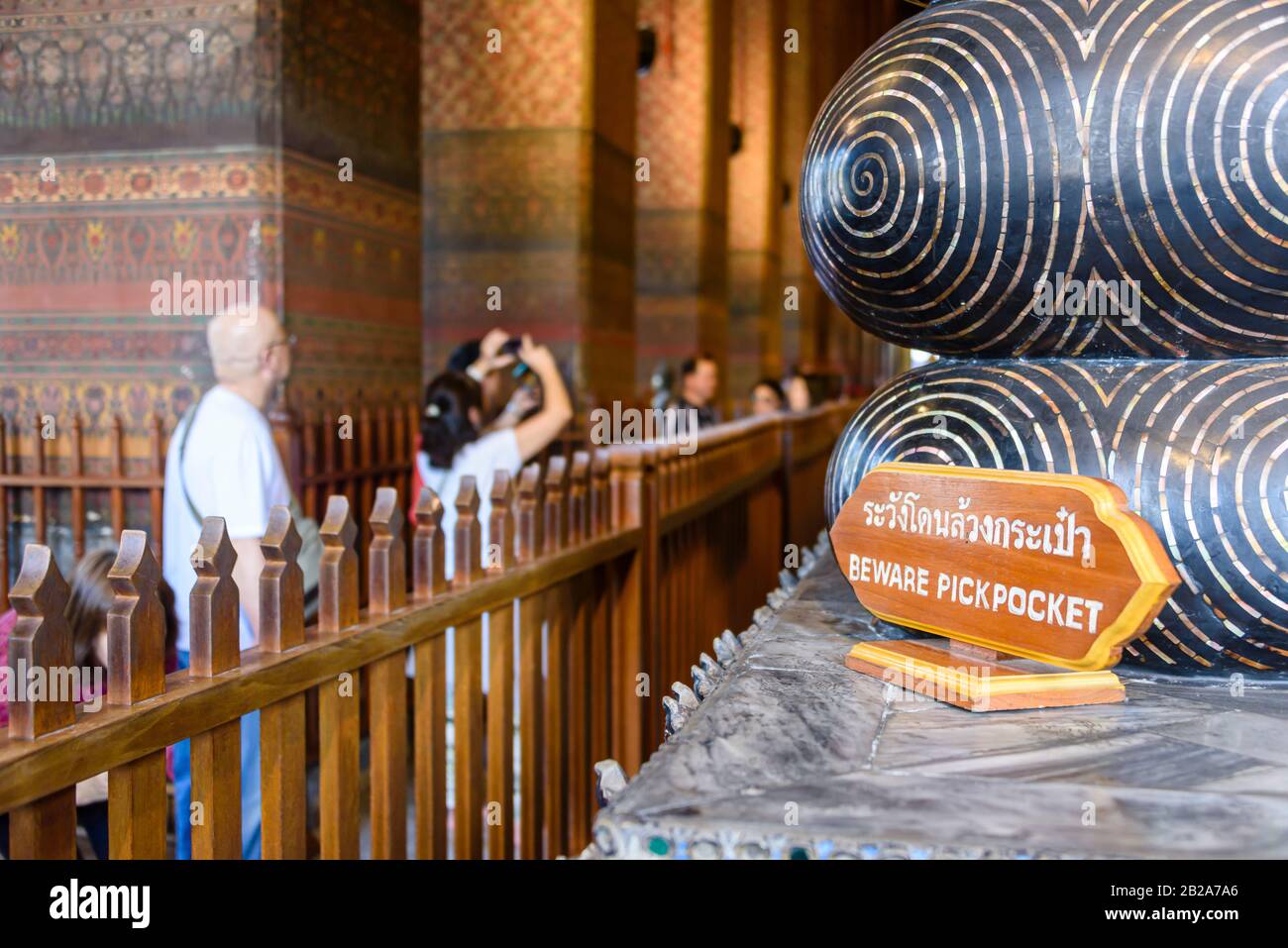 Sign at a tourist attraction warning visitors to be aware of ...