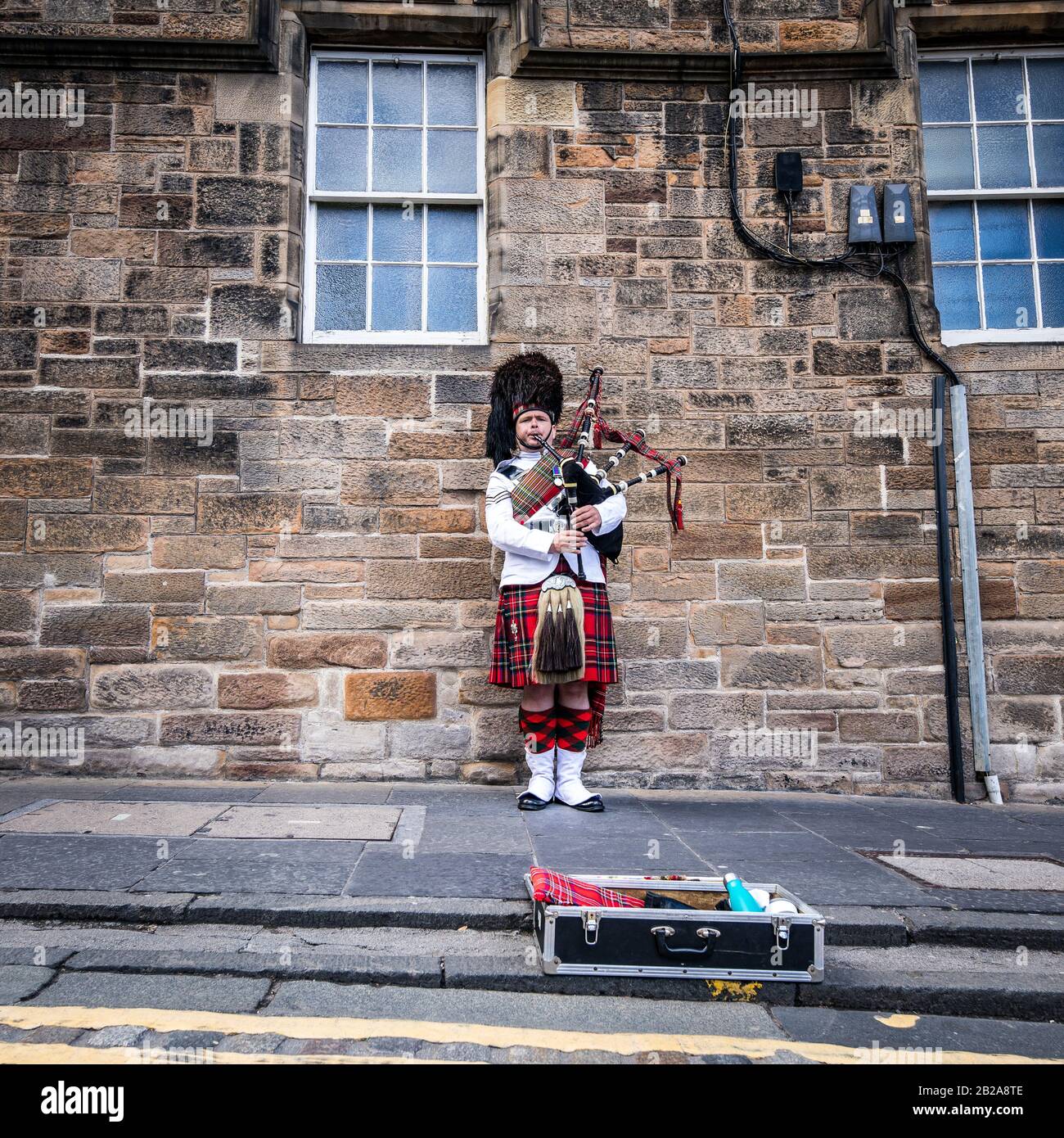 SCOTLAND, UNITED KINGDOM - MAY 30, 2019: Scottish piper in traditional ...