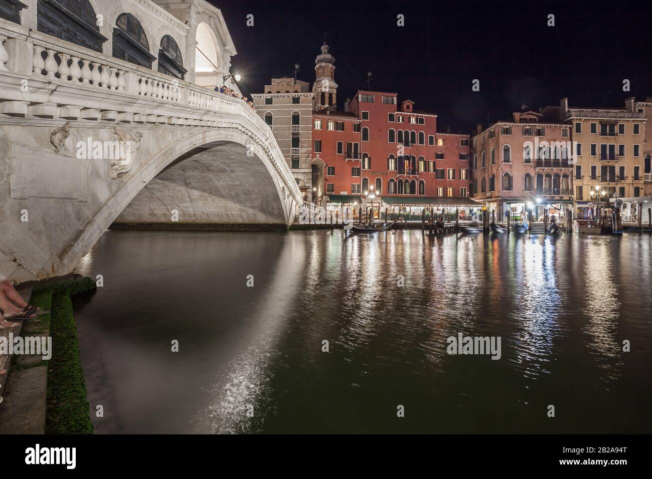 A wonderful view of Rialto Bridge at night in Venice, Italy Stock Photo ...