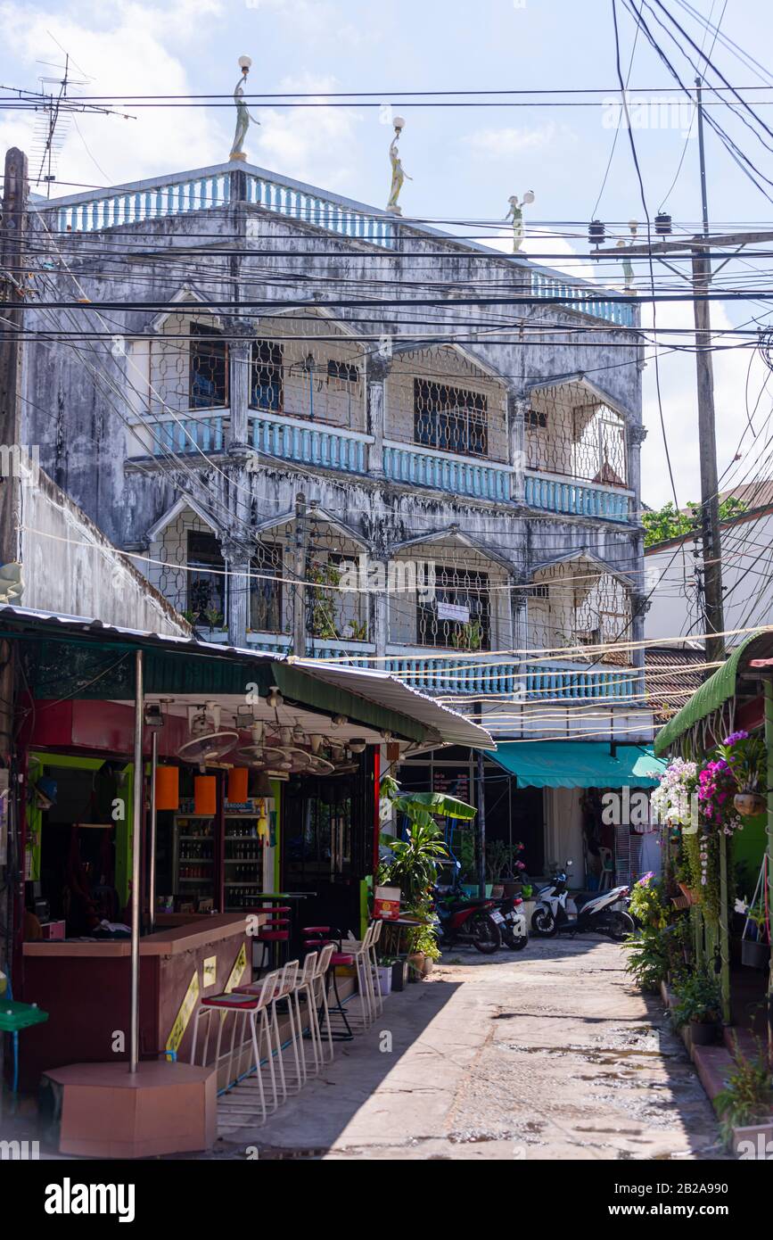 Messy and untidy electrical cables hanging from an electricity pole ...