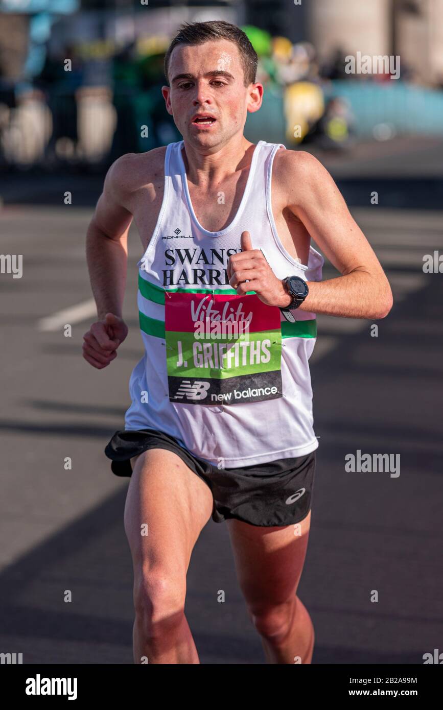 Josh Griffiths racing in the Vitality Big Half half marathon crossing ...