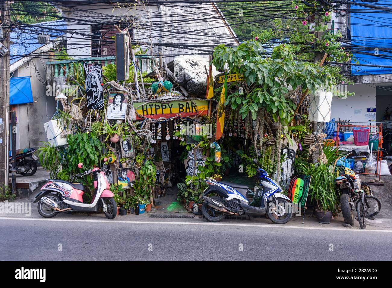 Messy and untidy electrical cables hanging from an electricity pole ...
