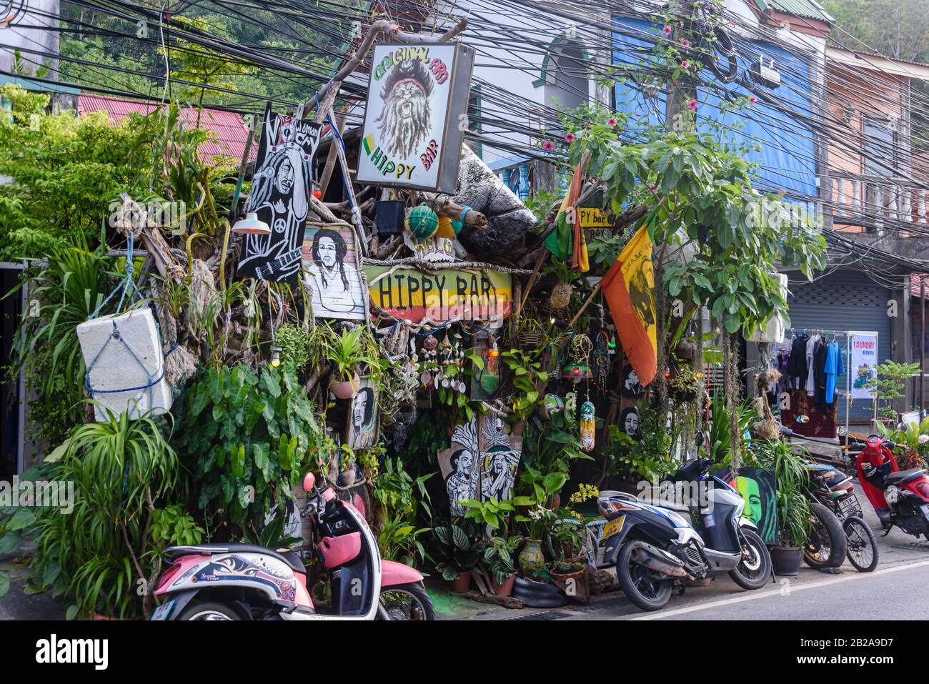 Messy and untidy electrical cables hanging from an electricity pole in ...
