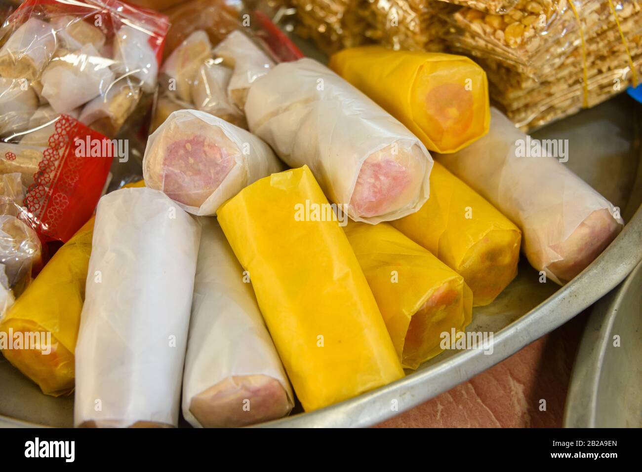 Raw spring rolls made with rice paper ready to be cooked at a Thai ...