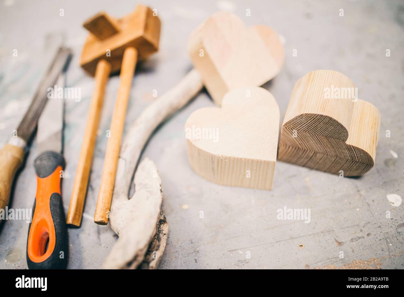 Manual processing of wood in the carpentry workshop - craft production ...