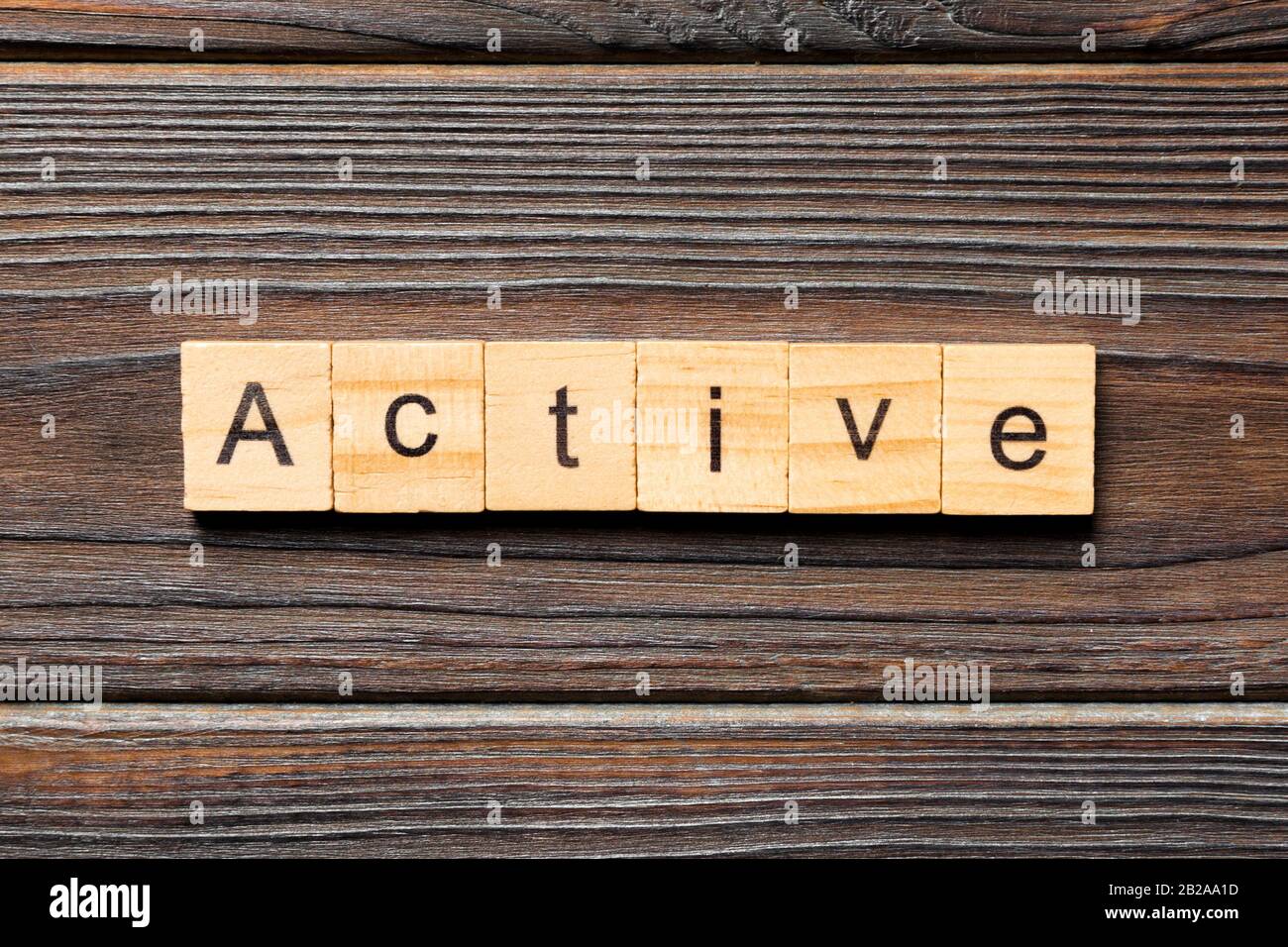 active word written on wood block. active text on table, concept Stock ...