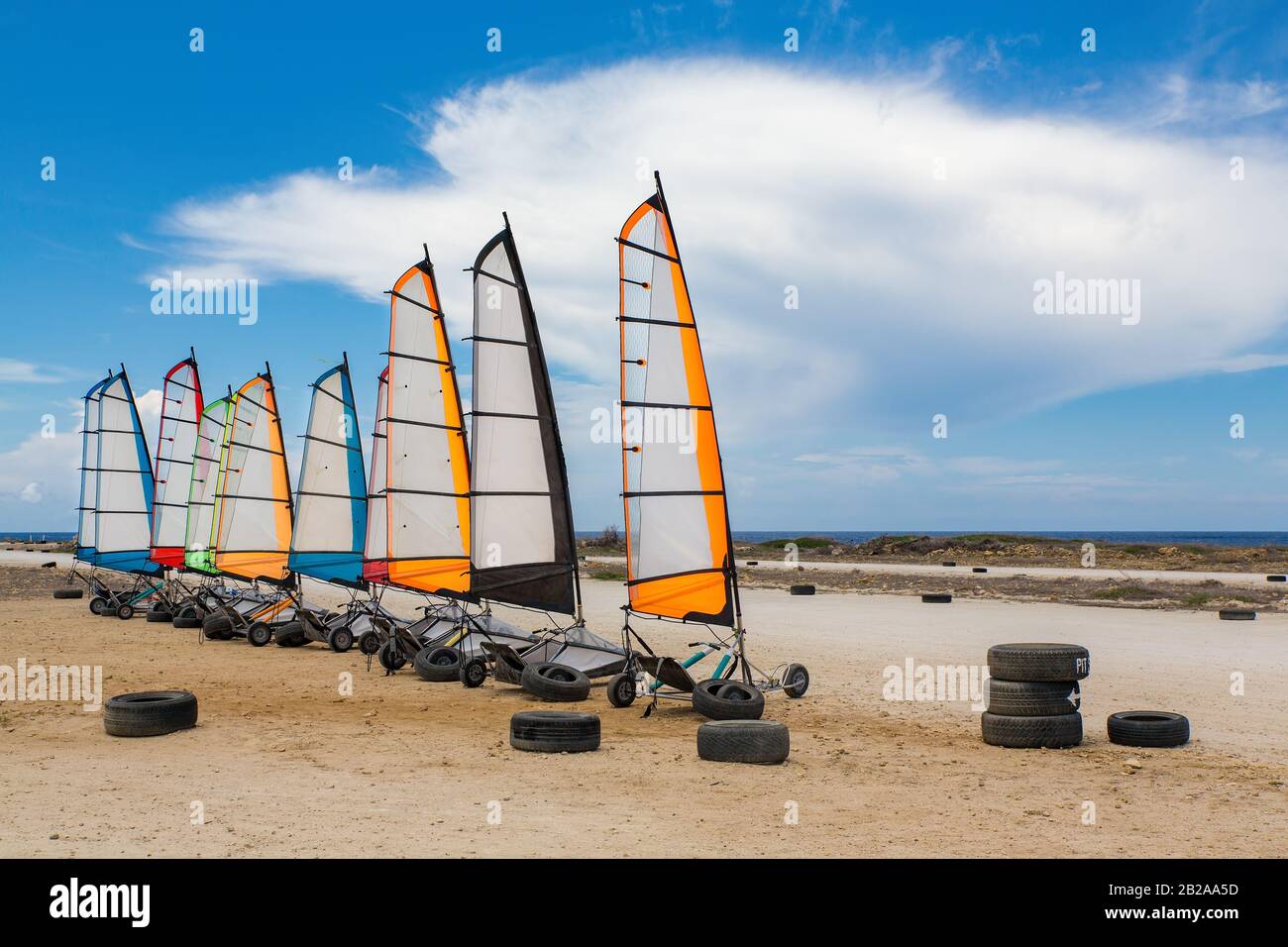 Race track on coast with sailing buggies in a row Stock Photo - Alamy