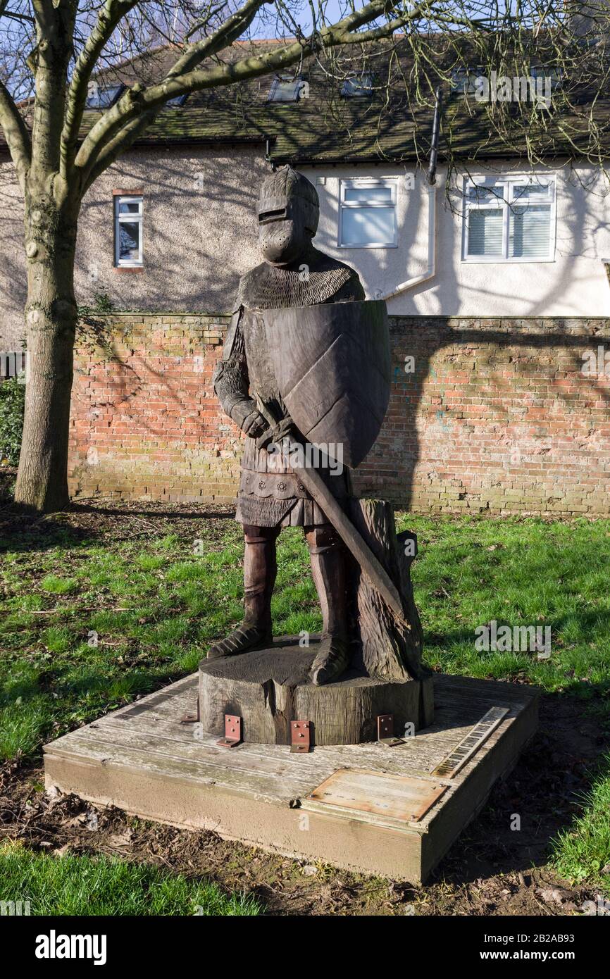 Carved wooden medieval knight on the site of the old castle ...