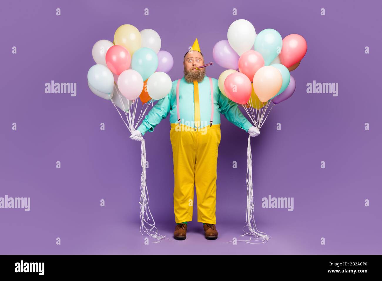 Full body photo shocked crazy excited fat man hold air baloons ...