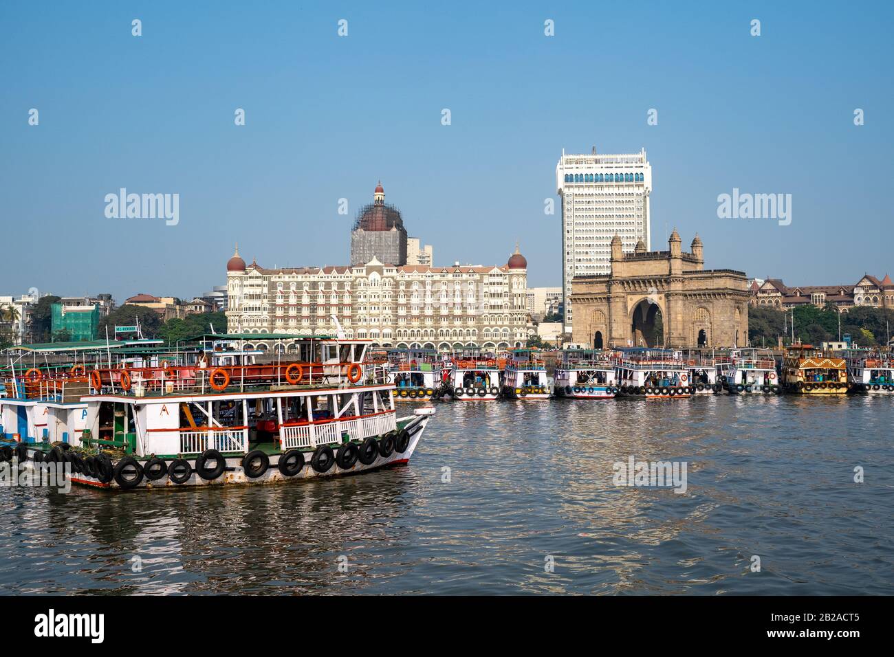 Mumbai, India - February 29, 2020: Ferry harbor of Mumbai with a view from the water of ferry ...