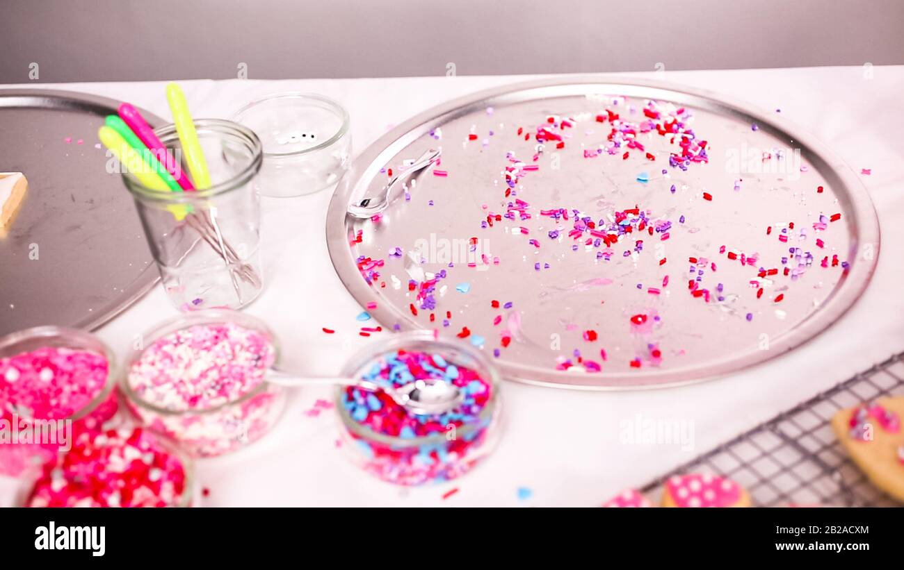 Step by step. Decorating sugar cookies with royal icing and sprinkles ...