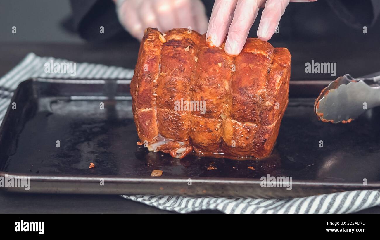 Step by step. Cooked boneless pork roast rubbed with spice rub Stock ...