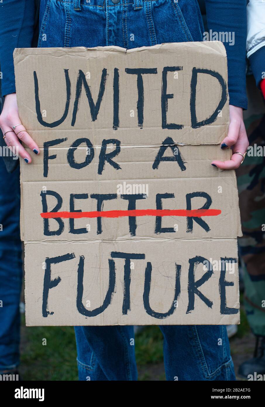 Student activist with sign at the Youth Strike For Climate ...