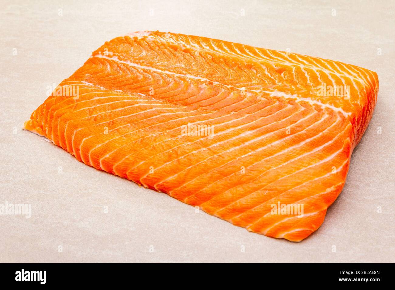 A piece of raw trout fillet (salmon). Ingredient for cooking healthy ...