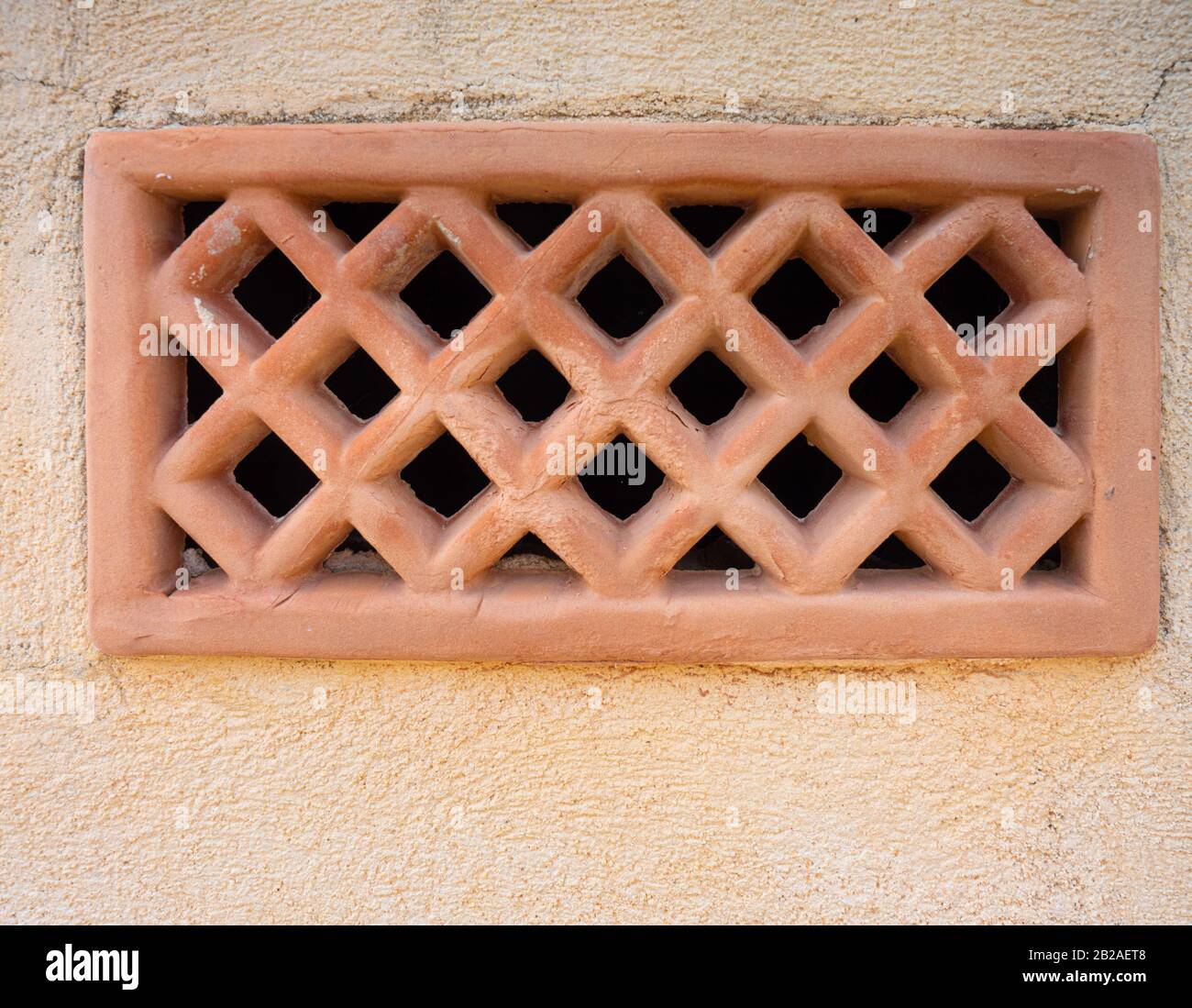 The Brick wall with old ventilation plate. Typical solution Stock Photo ...
