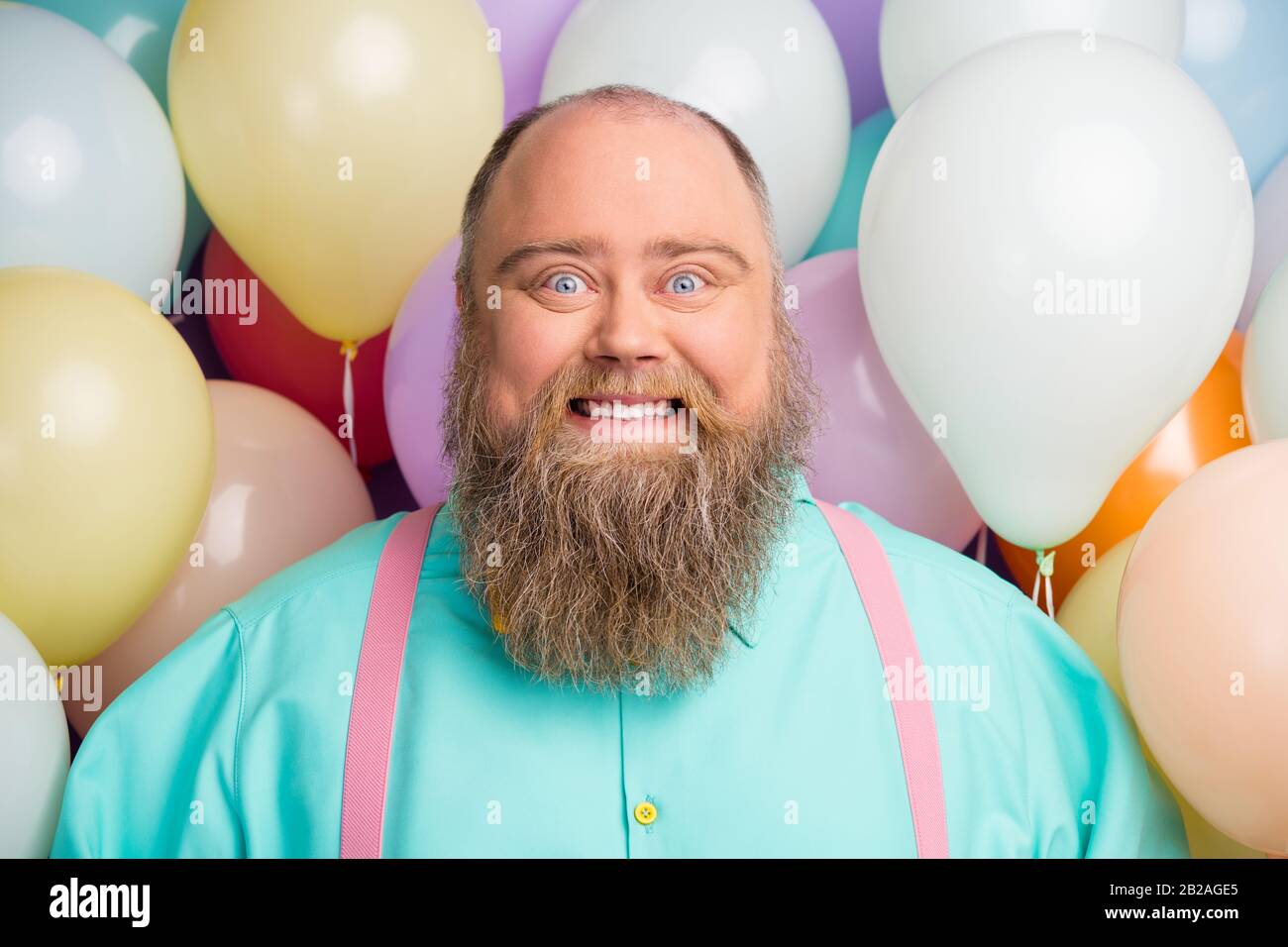 Portrait of candid funny funky crazy man with big abdomen belly enjoy ...