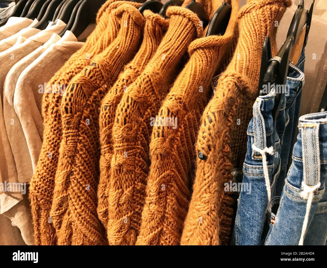 Woman sweaters closet hi-res stock photography and images - Alamy