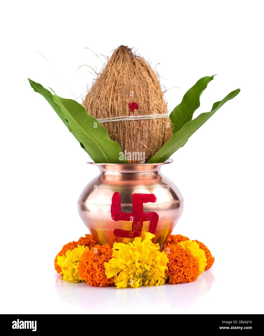 Copper Kalash With Coconut And Mango Leaf With Floral Decoration On A White Background copper-kalash-with-coconut-and-mango-leaf-with-floral-decoration-on-a-white-background