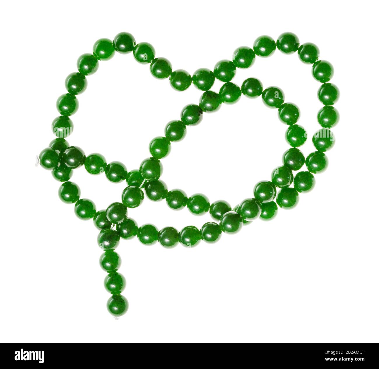 string of round beads from natural green nephrite gemstones isolated on ...