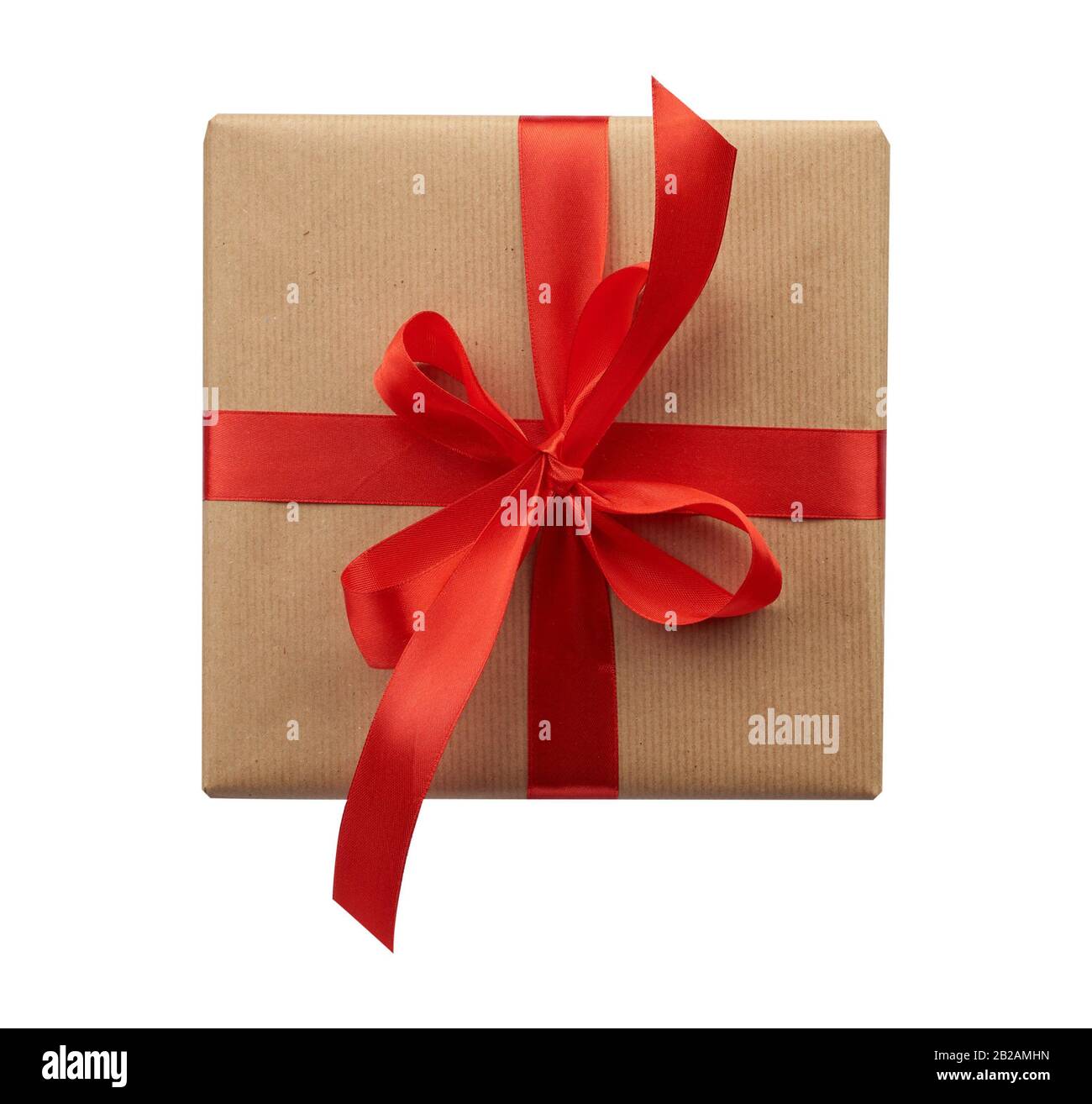 square box wrapped in brown kraft paper and tied with a silk red ribbon ...