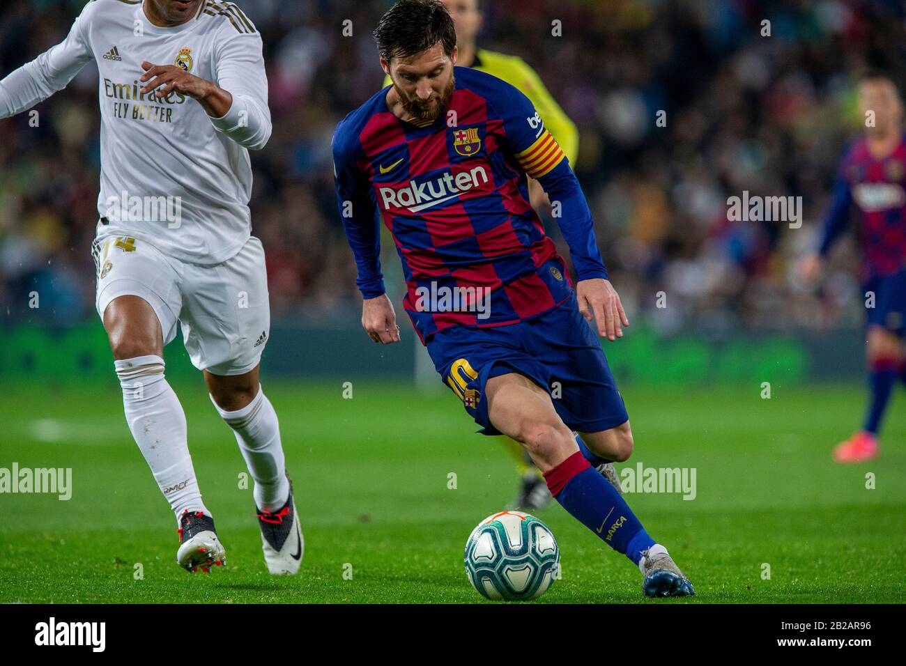 Lionel Messi (R) in action during the Spanish La Liga match round 26 ...