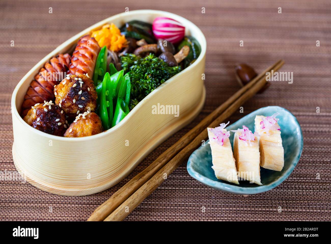 Traditional wooden japanese bento hi-res stock photography and images ...